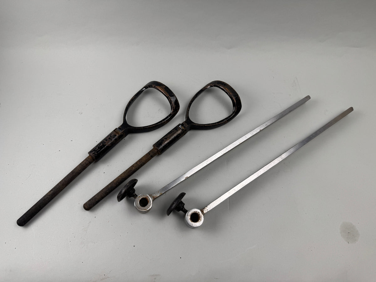 Pair set two Midmark Ritter Table Stirrups chrome base black feet guid ...